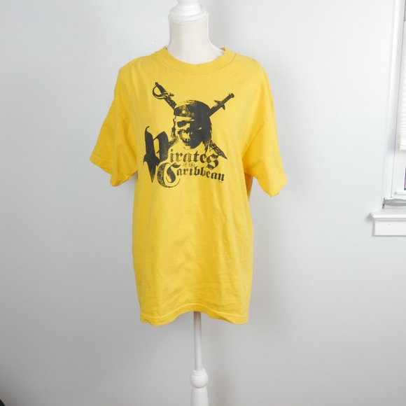 Disney | Shirts | Disney Pirates Of The Caribbean Yellow Graphic Tee ...